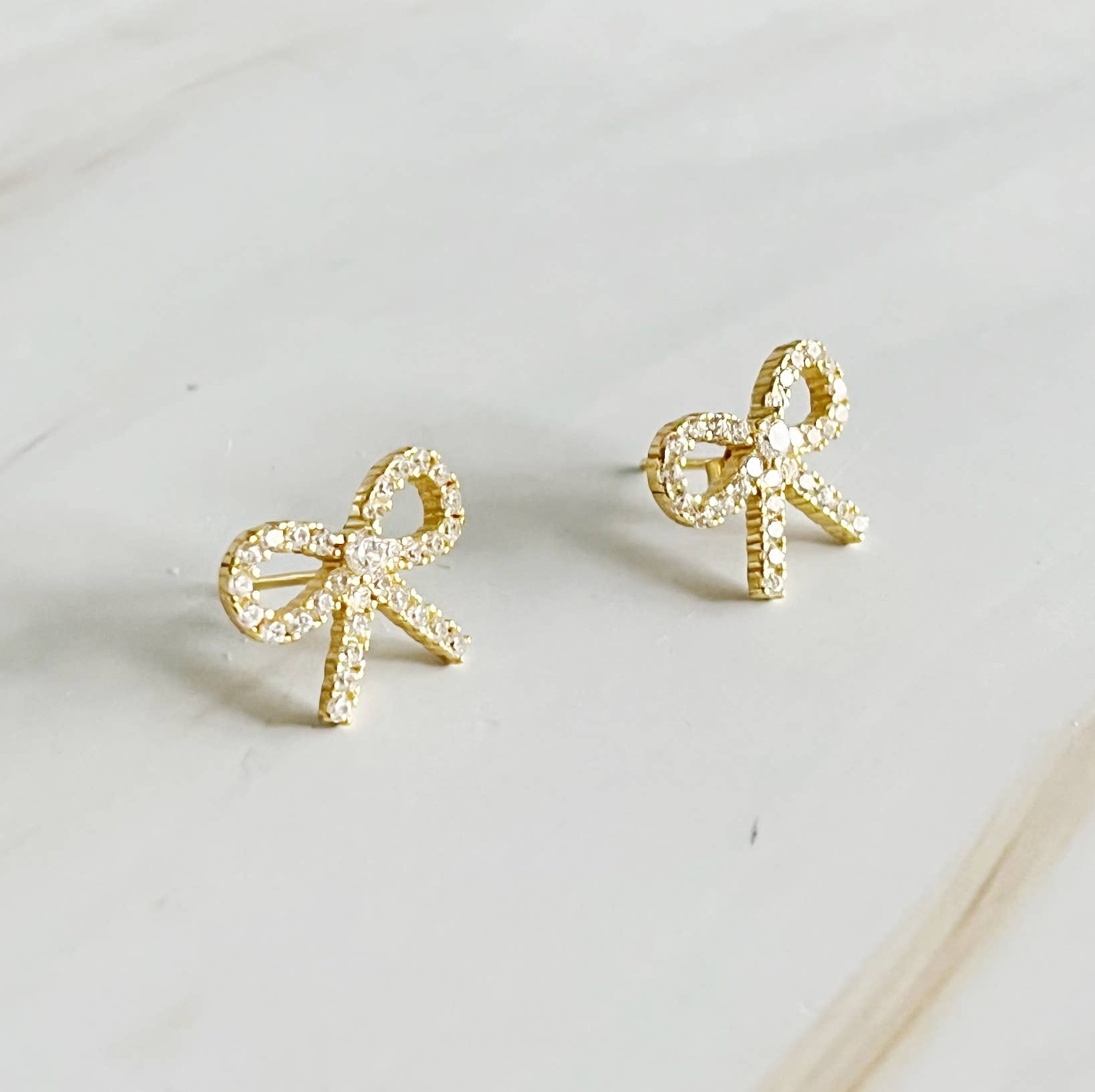 Shine Mini Bow Sterling Silver Earrings – Zen + Zeus Clothing Co.
